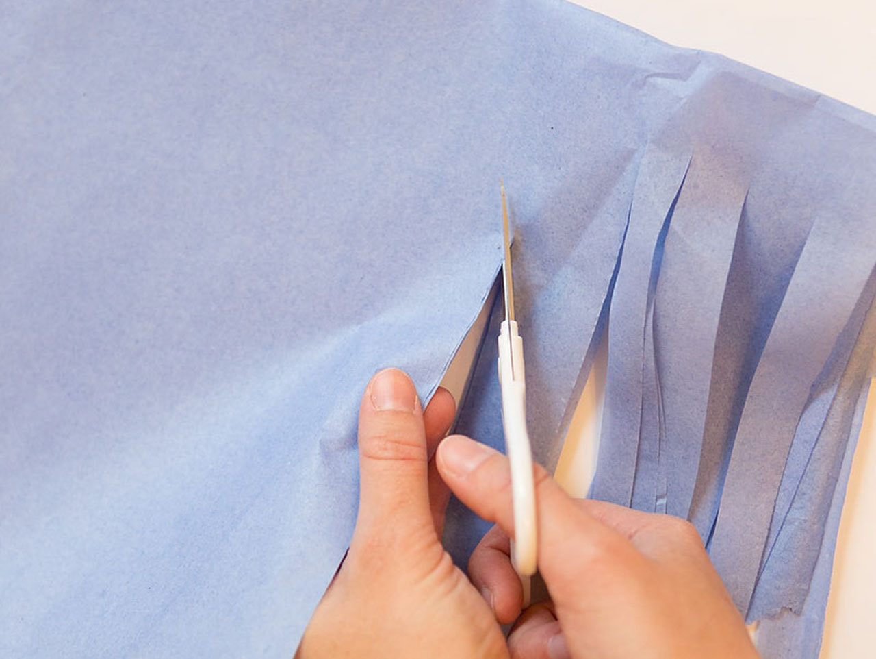 Make a Heart Shaped Fringed Tissue Paper Backdrop | Fun365